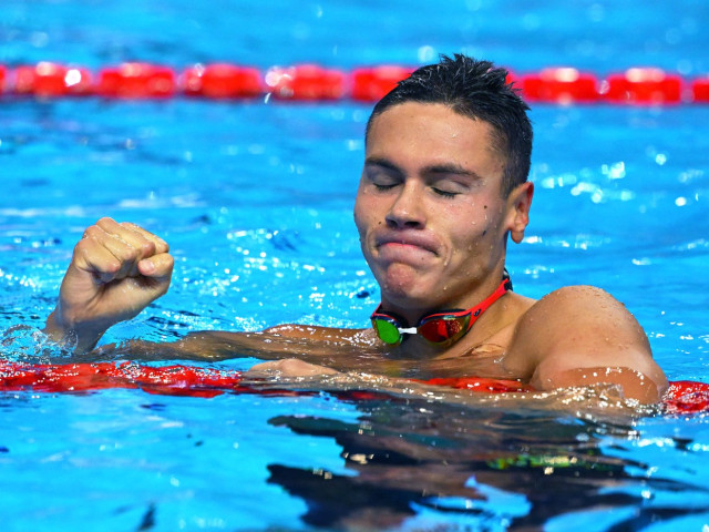 GALERIE FOTO: Reacția lui David Popovici, după ce s-a calificat în semifinale la 100 m liber ...